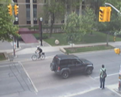 On Segmentation of Moving Objects by Integrating PCA Method with the Adaptive Background Model